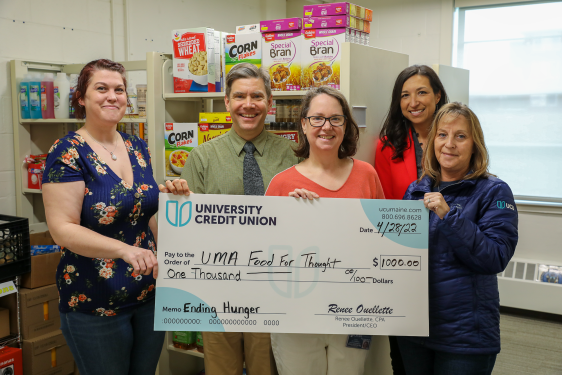 University Credit Union presents checks to University of Maine at ...